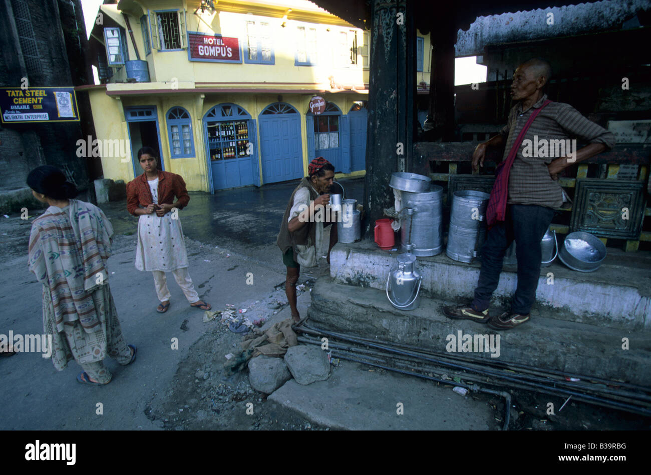 Indians rise early to buy fresh milk from a vendor in Kalimpong, West ...