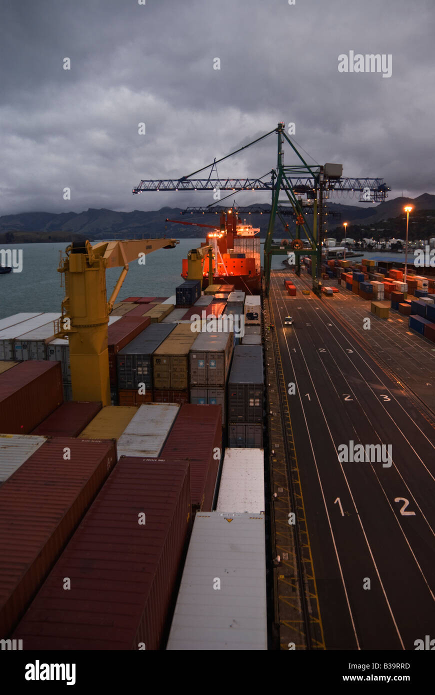 Container ships alongside the dock in early morning light at the ...