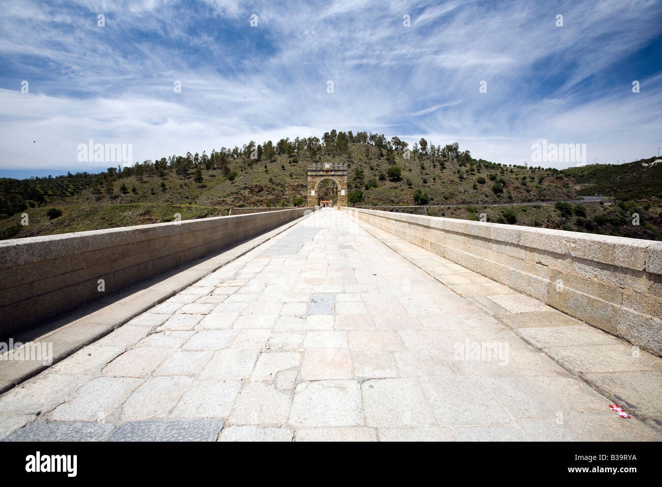The road carried by Alcantara Roman bridge, Caceres, Spain Stock Photo ...