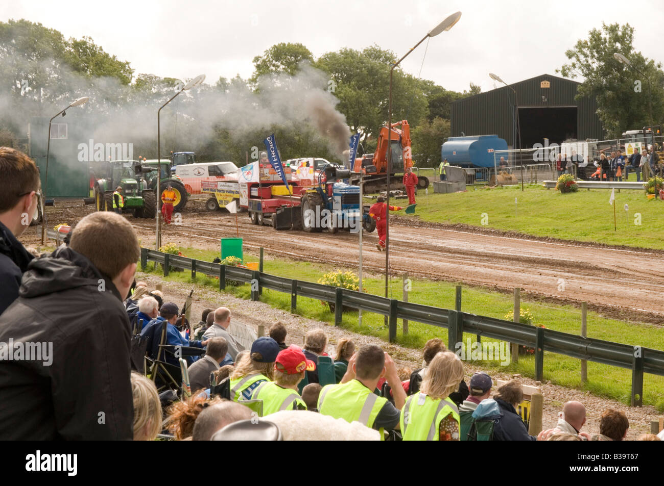 Diesel black smoke engine tractor pulling Stock Photo - Alamy