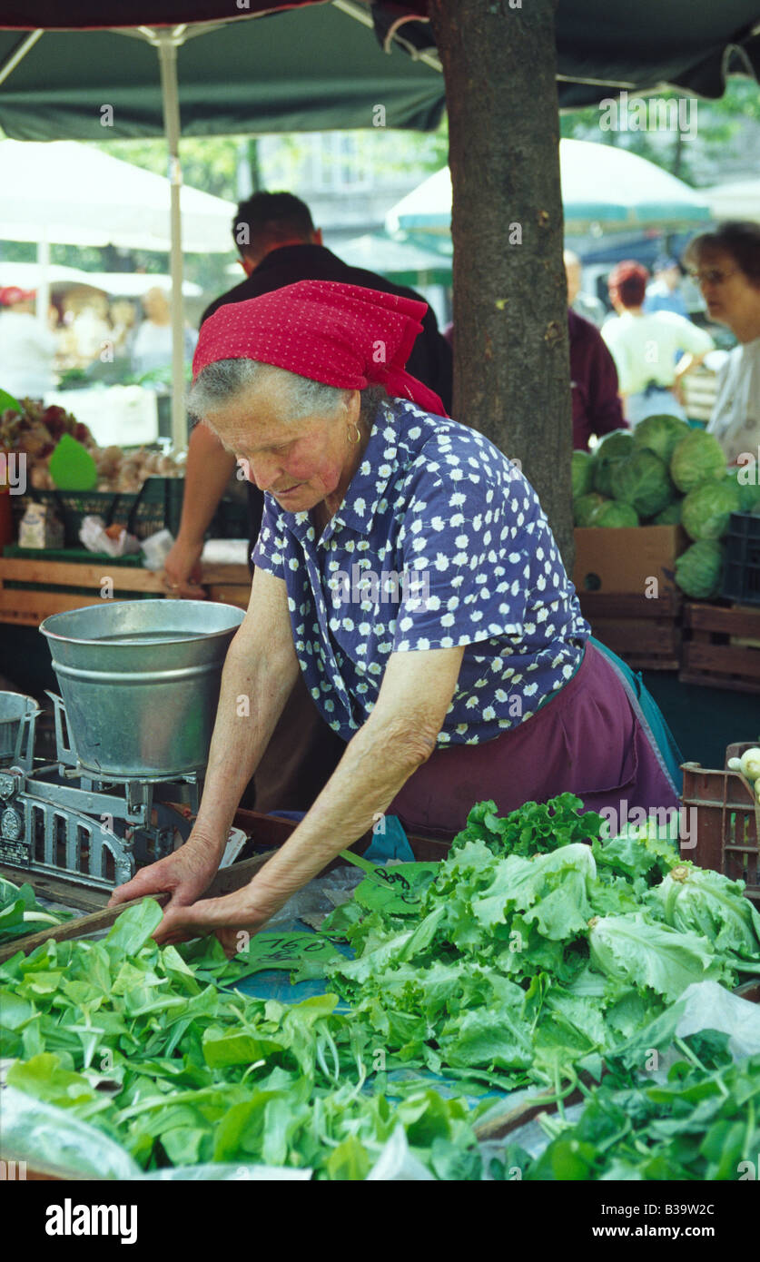 Lady selling lettuces on a vegetable stall in the market at Vodnikov ...