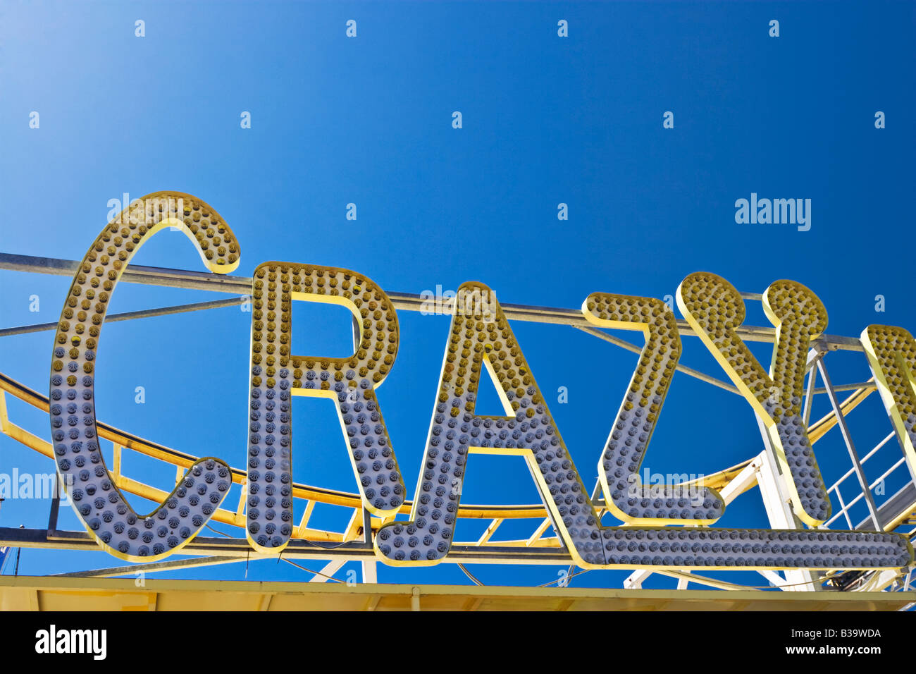 Crazy Mouse roller coaster sign on Brighton Pier Stock Photo - Alamy