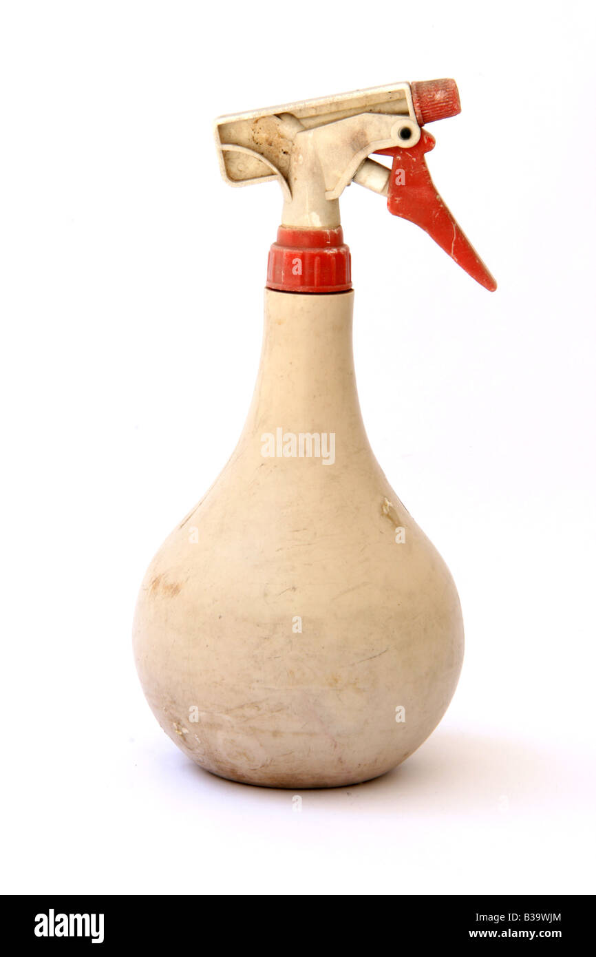 old used sprayer bottle isolated on white background Stock Photo - Alamy