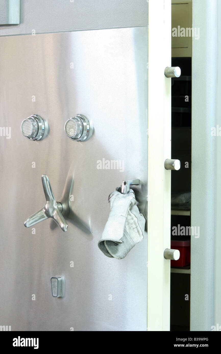 steel safe box open by thief with a glove on handler Stock Photo - Alamy