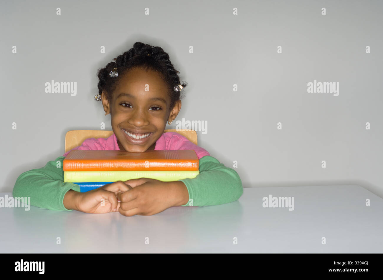 African girl books stack hi-res stock photography and images - Alamy
