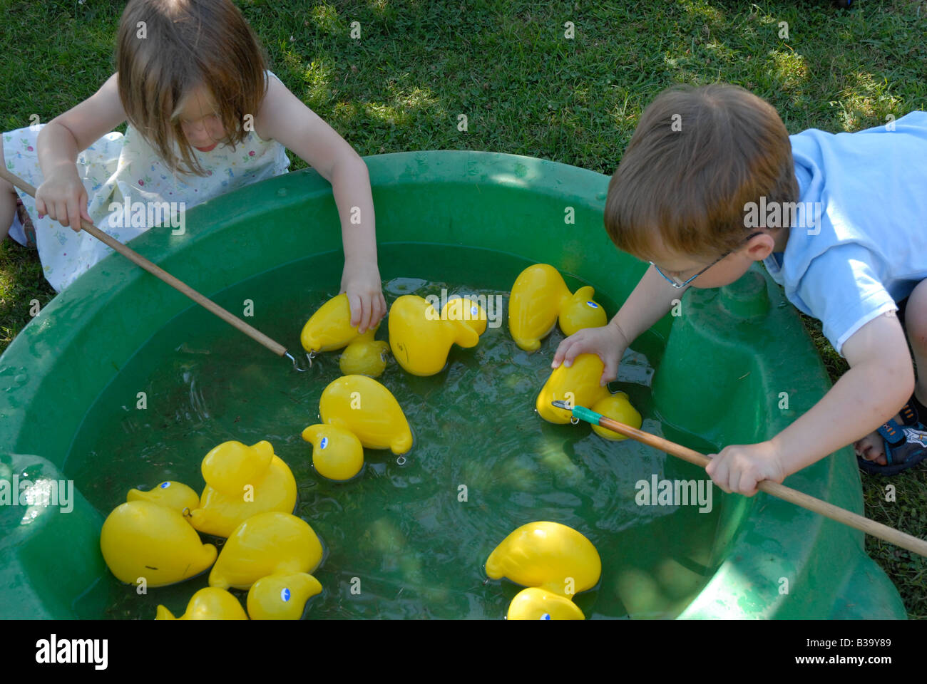 Boy girl ducks hi-res stock photography and images - Alamy