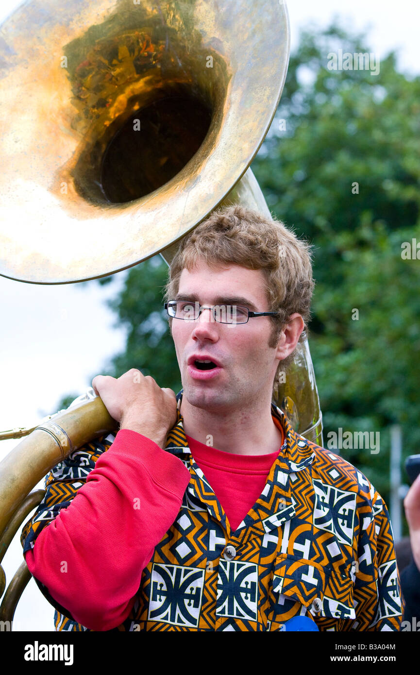 man carrying tuba Stock Photo - Alamy