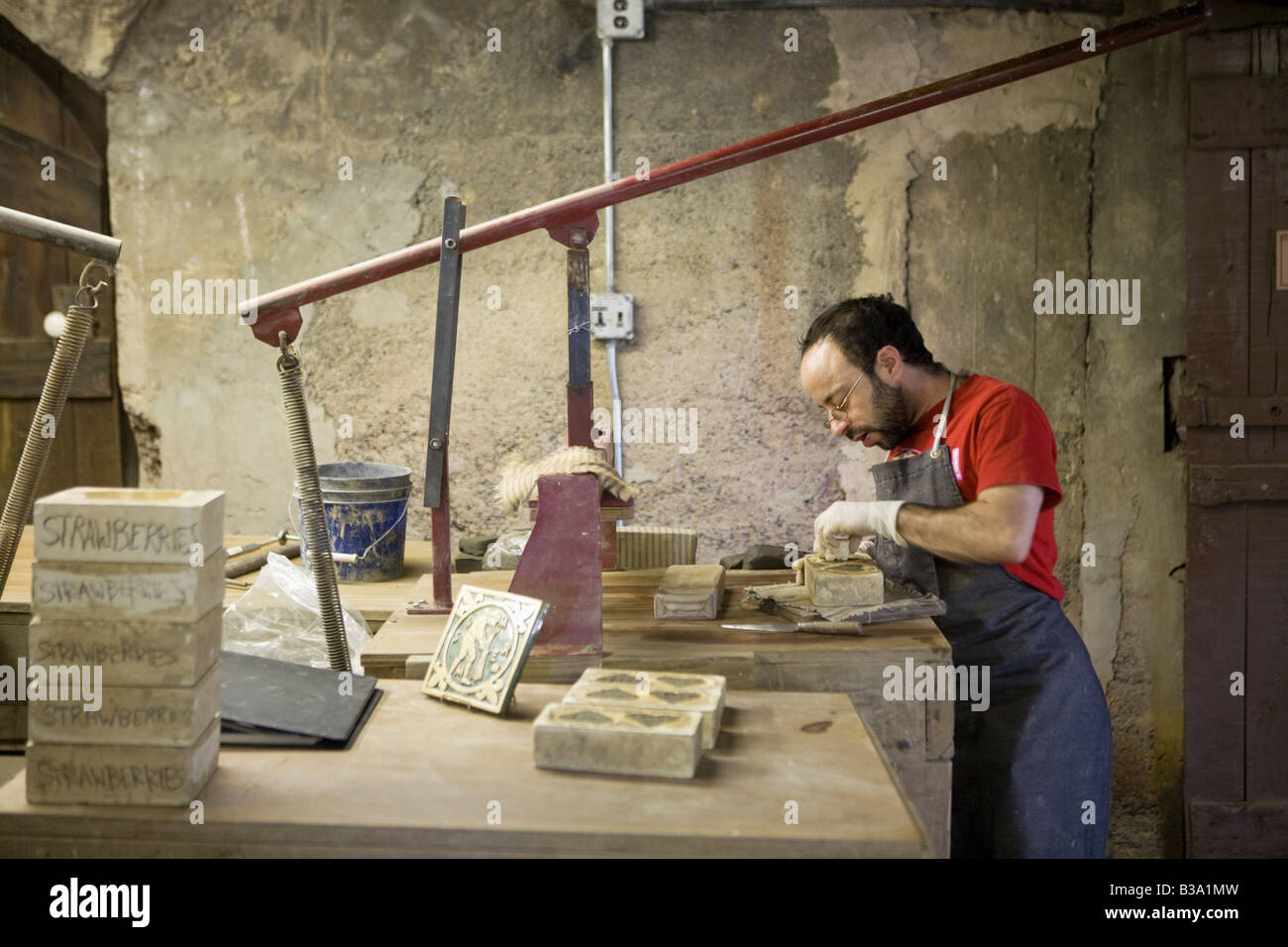 Ceramist making tiles at Moravian Pottery and Tile Works Doylestown ...
