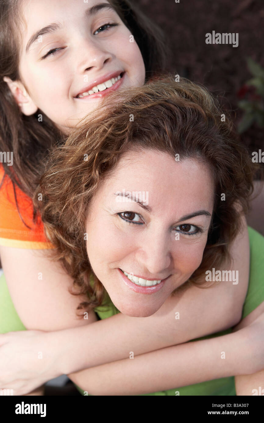 Hispanic girl hugging mother Stock Photo - Alamy
