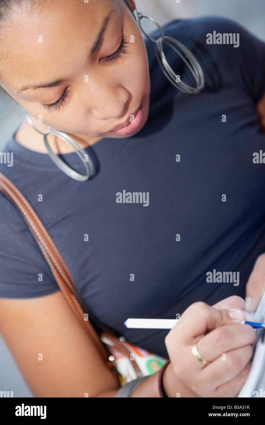 African woman writing Stock Photo - Alamy