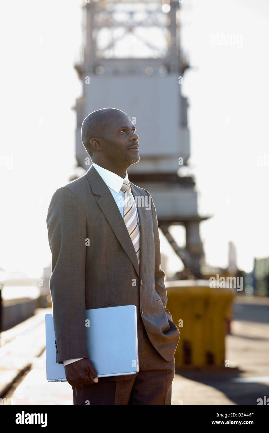 African American businessman holding laptop Stock Photo - Alamy African American businessman holding laptop Stock Photo - Alamy