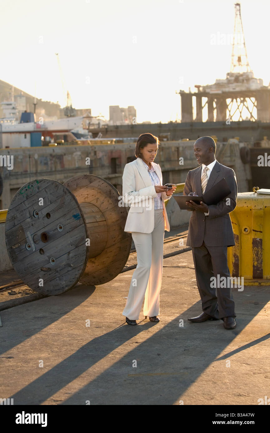 African American businesspeople on commercial pier Stock Photo - Alamy