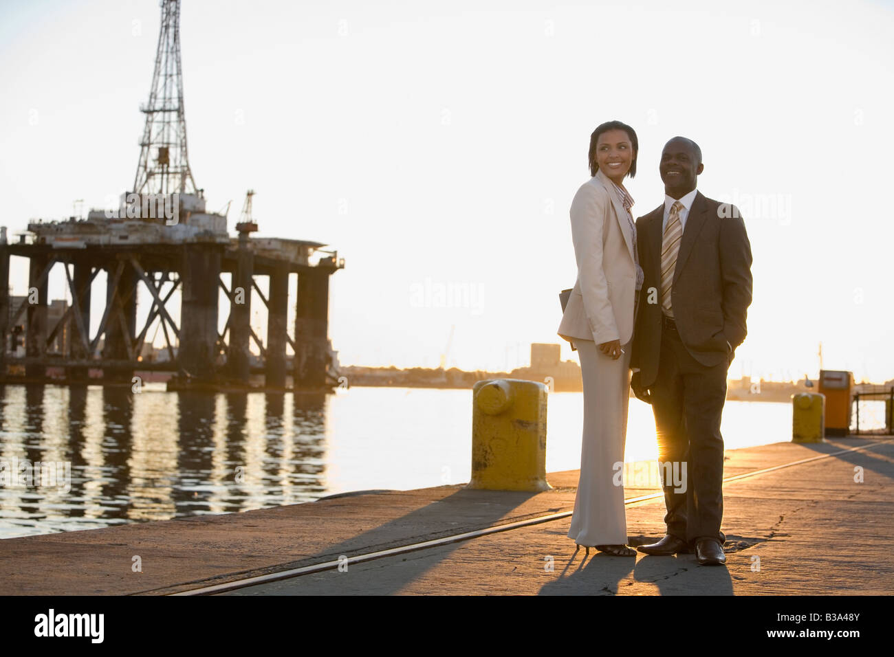African American businesspeople on commercial pier Stock Photo - Alamy