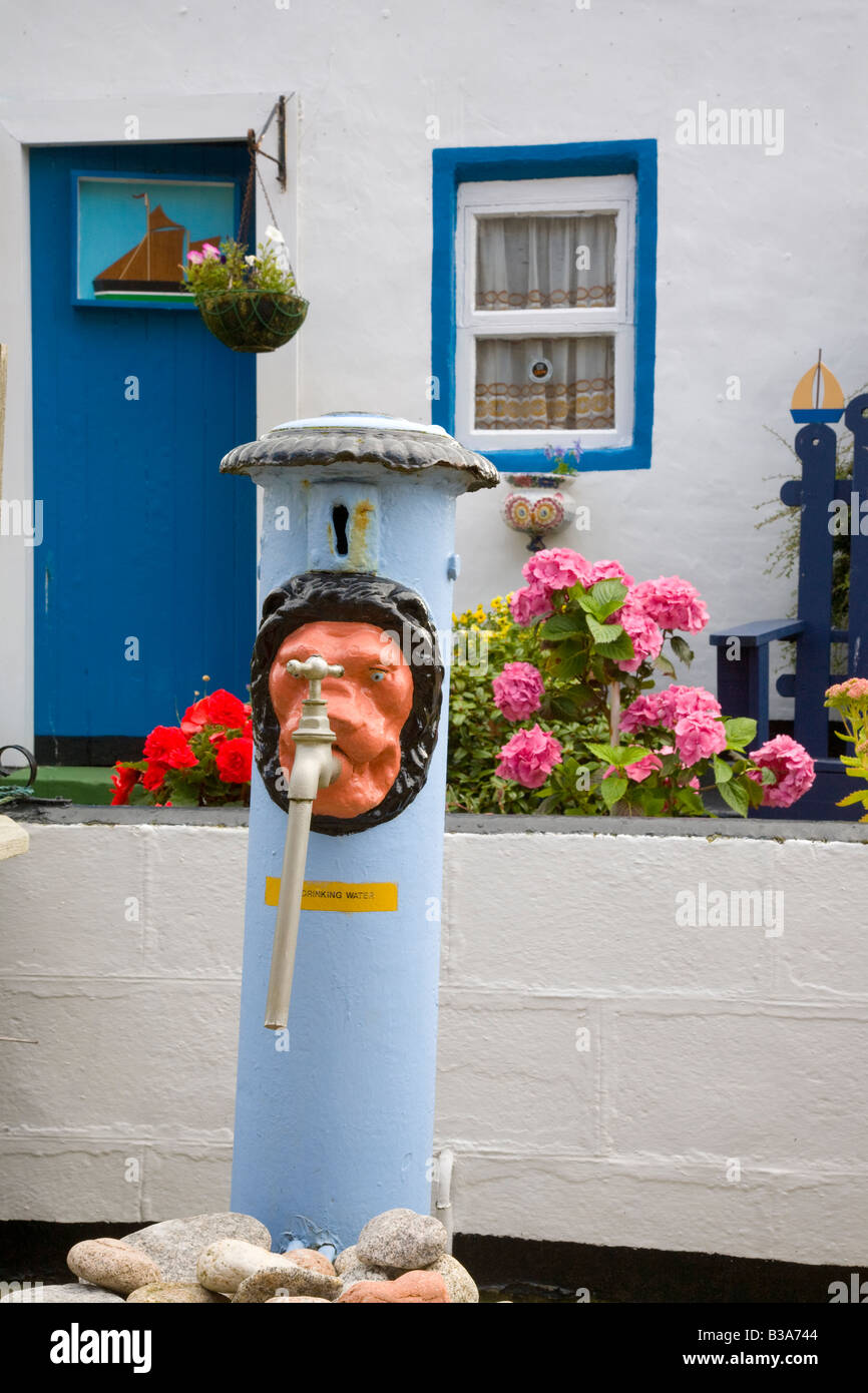 Vintage blue antique cast iron street standpipe hydrant, with face ...