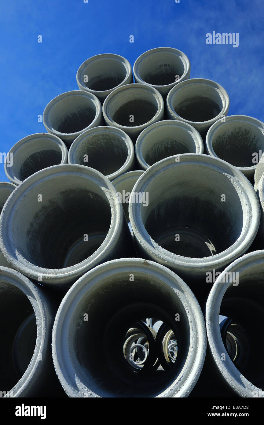 Pipes piled high into the sky Stock Photo - Alamy