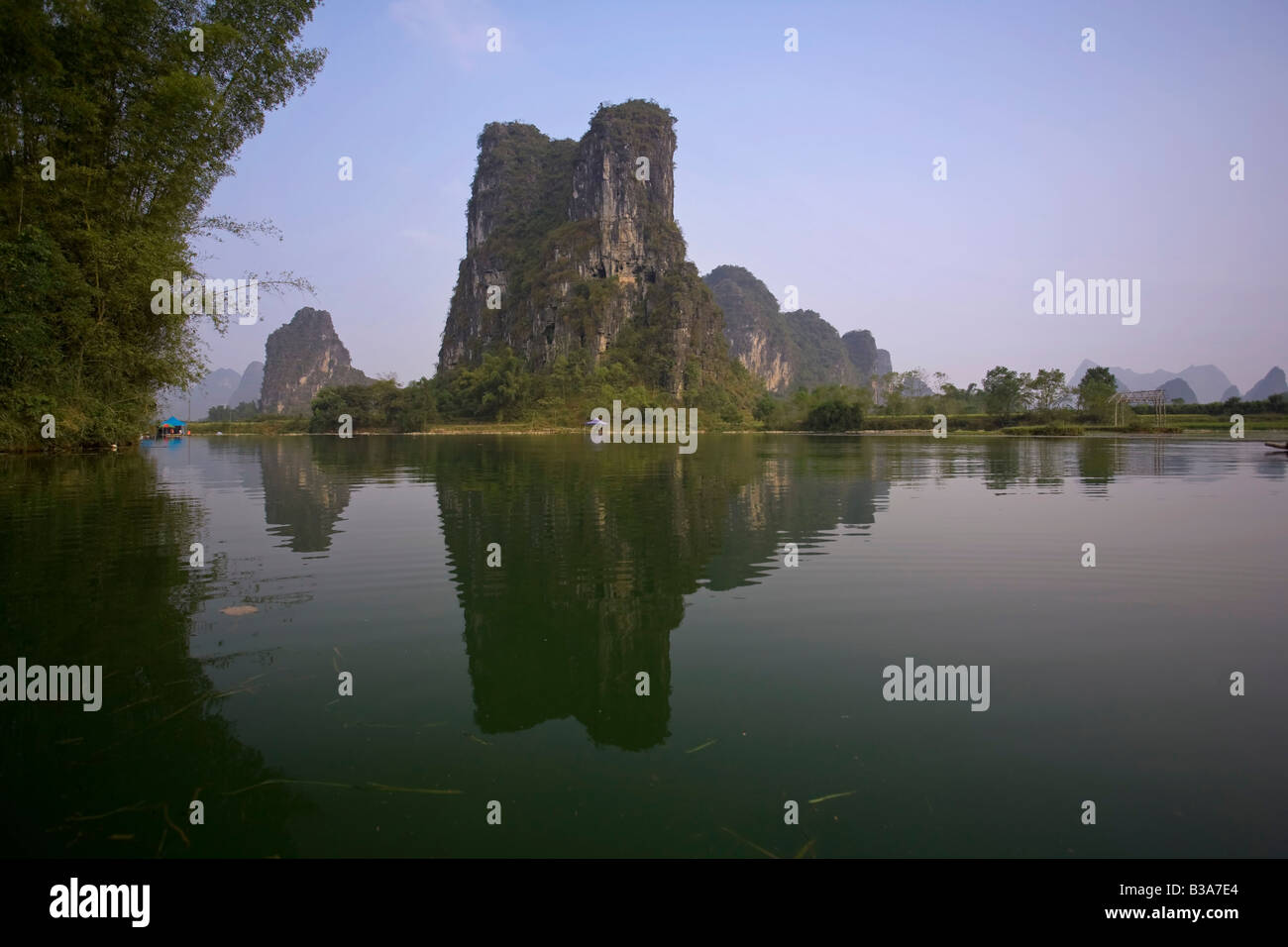 Navigation on bamboo raft along Yulong He River, Yangshuo, Guilin ...