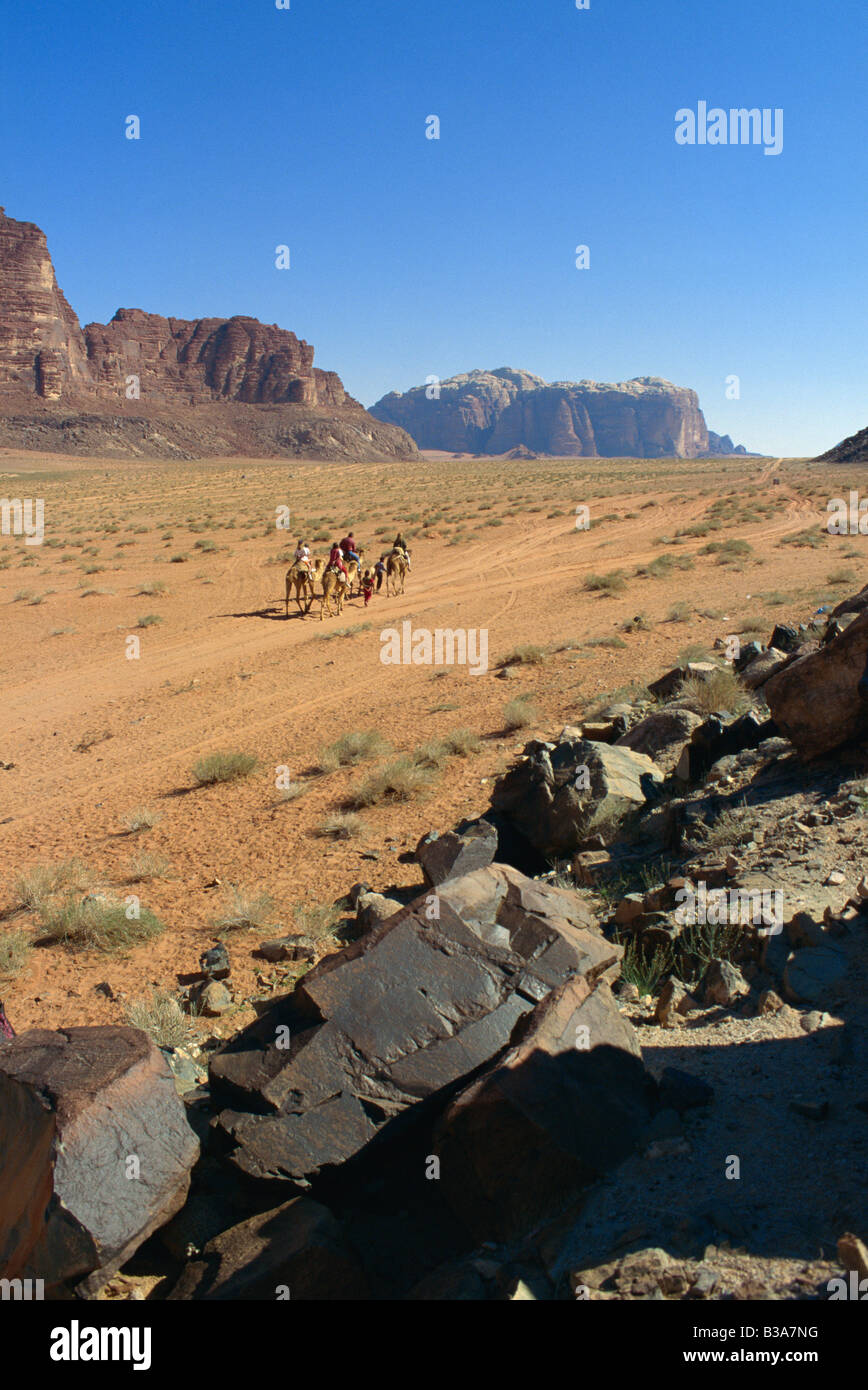 Tourists riding camels wadi rum hi-res stock photography and images - Alamy