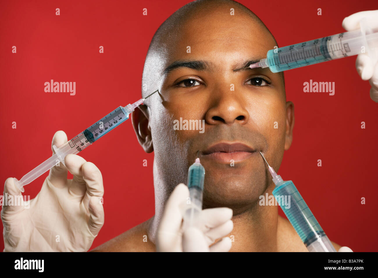 African American man receiving injections in face Stock Photo - Alamy