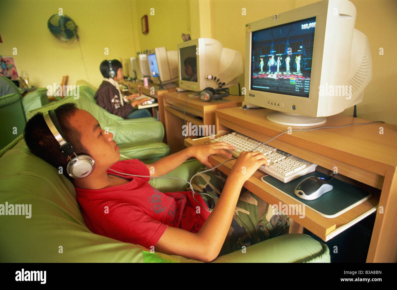 Thailand, Chiang Mai, Boy Playing Computer Games Stock Photo - Alamy