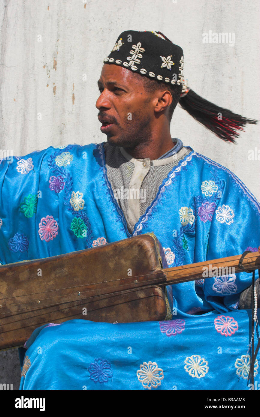Morocco, Marrrakesh, Old City, Medina, A whirling dirvish playes ...