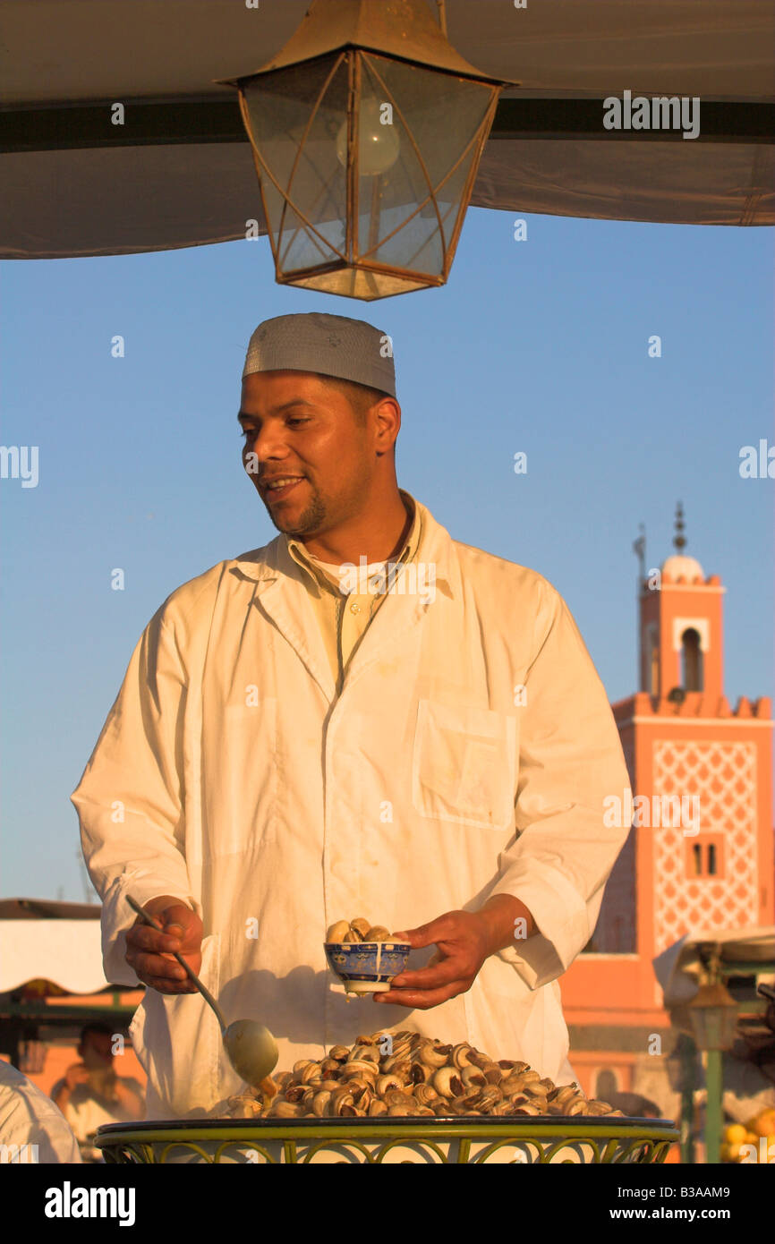 Morocco, Marrrakesh, Djemma El Fna Square, Man selling snails from ...