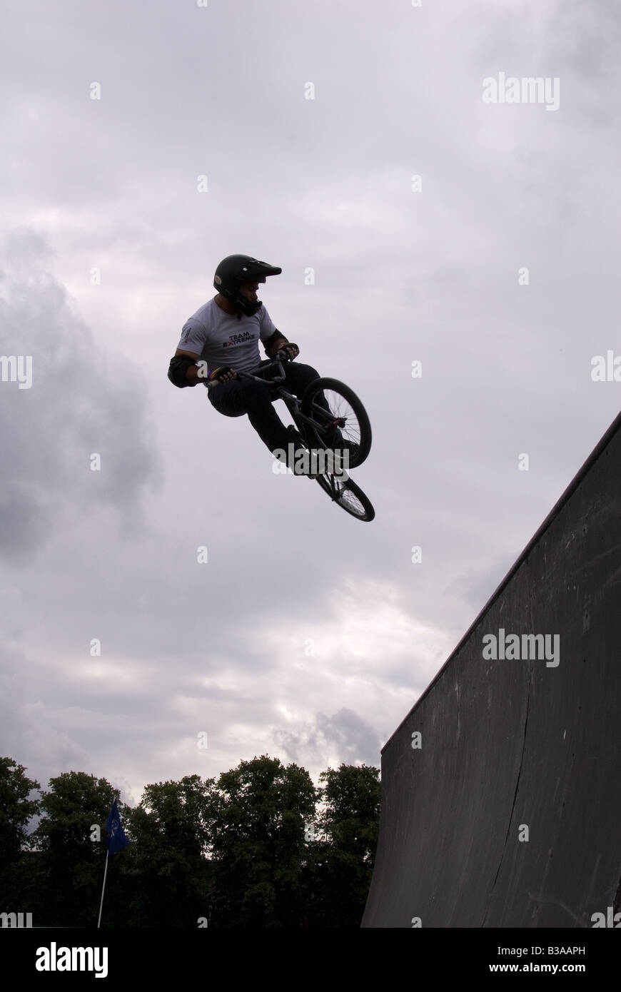 A BMX Rider Jumping from a Ramp displaying a trick Stock Photo - Alamy