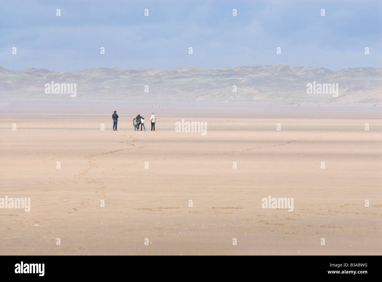 Walking along the Beach Stock Photo - Alamy