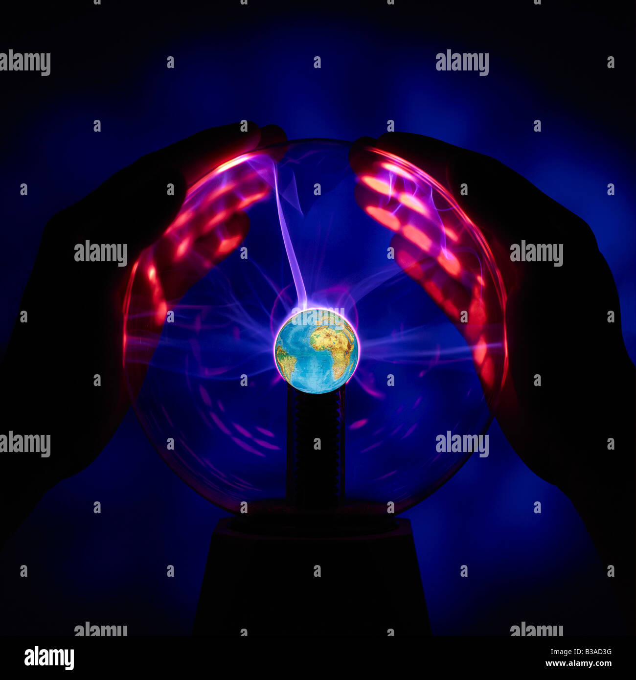 Globe inside a plasma ball Stock Photo - Alamy