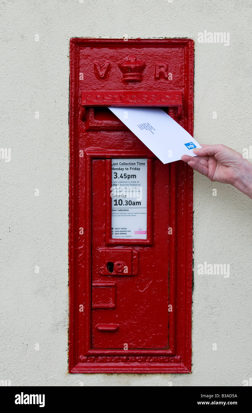 Royal mail postman woman hi-res stock photography and images - Alamy