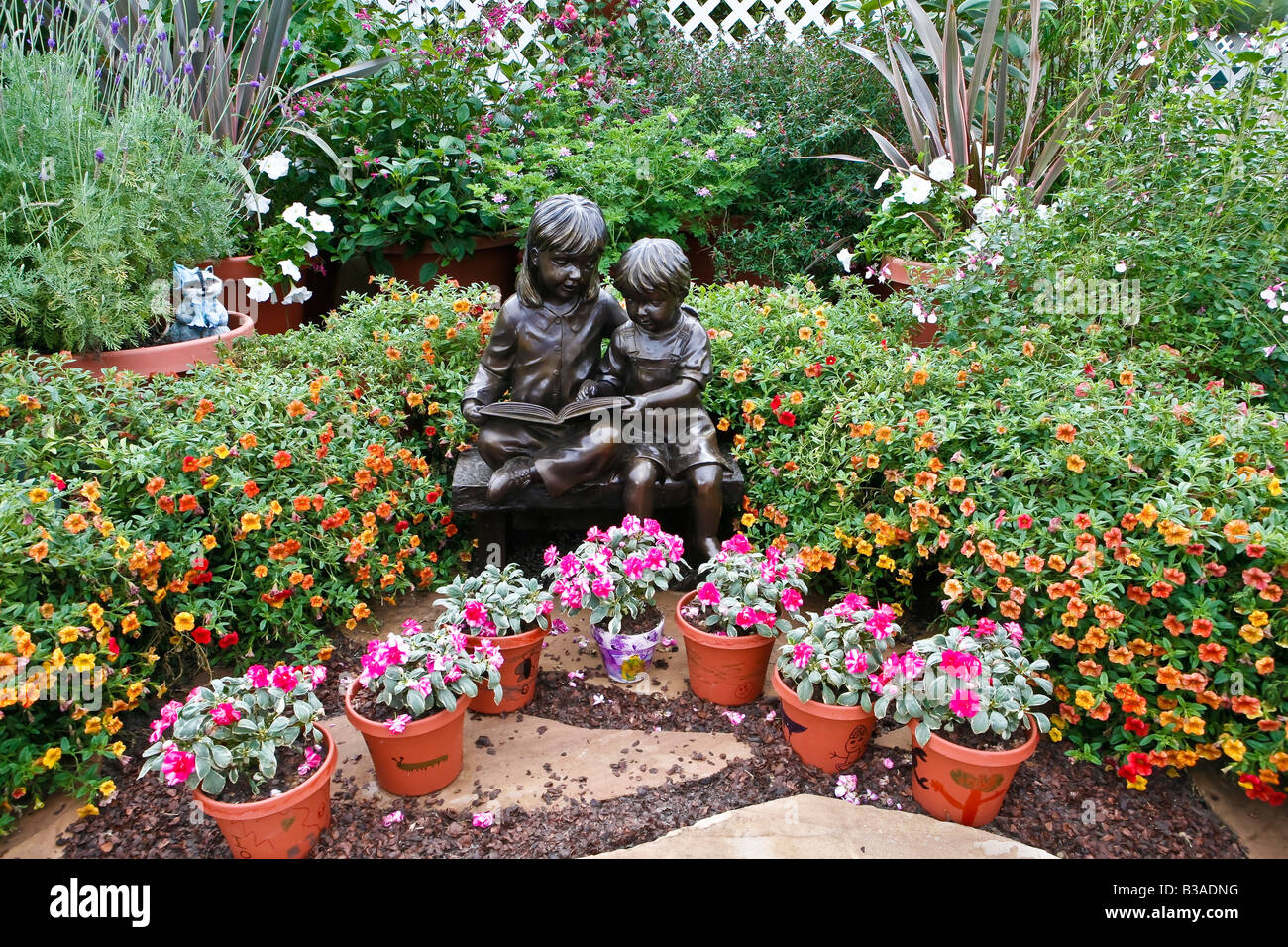 Statue and flowers in landscape display at the San Diego County Fair in ...