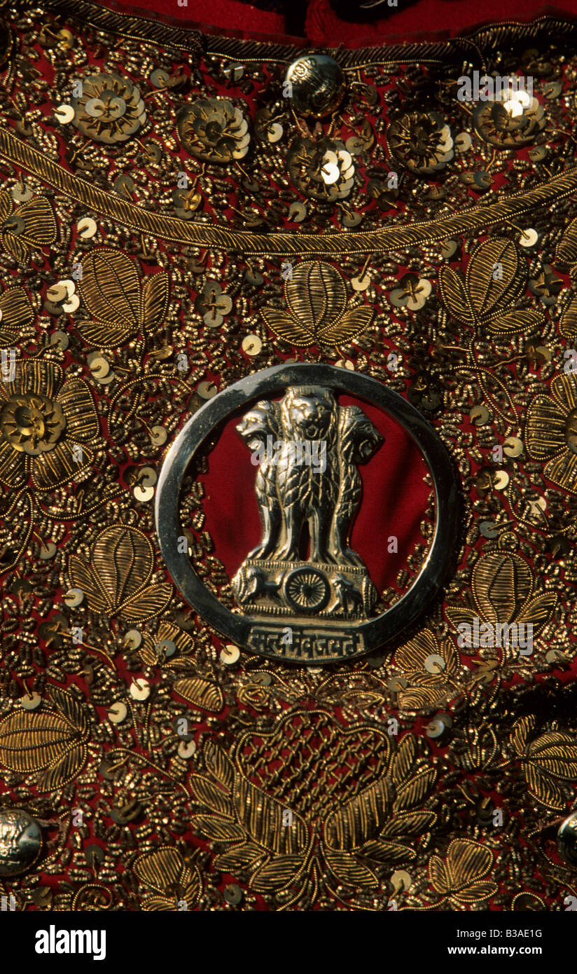 An embroidered Ashoka symbol adorns a tunic of a military dress uniform ...