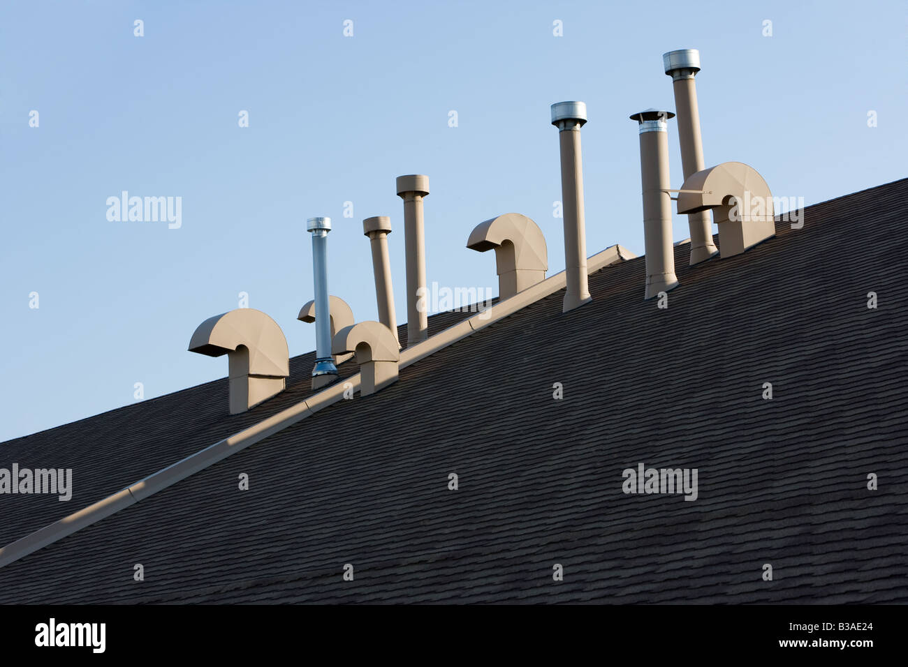 Many chimneys on roof hi-res stock photography and images - Alamy