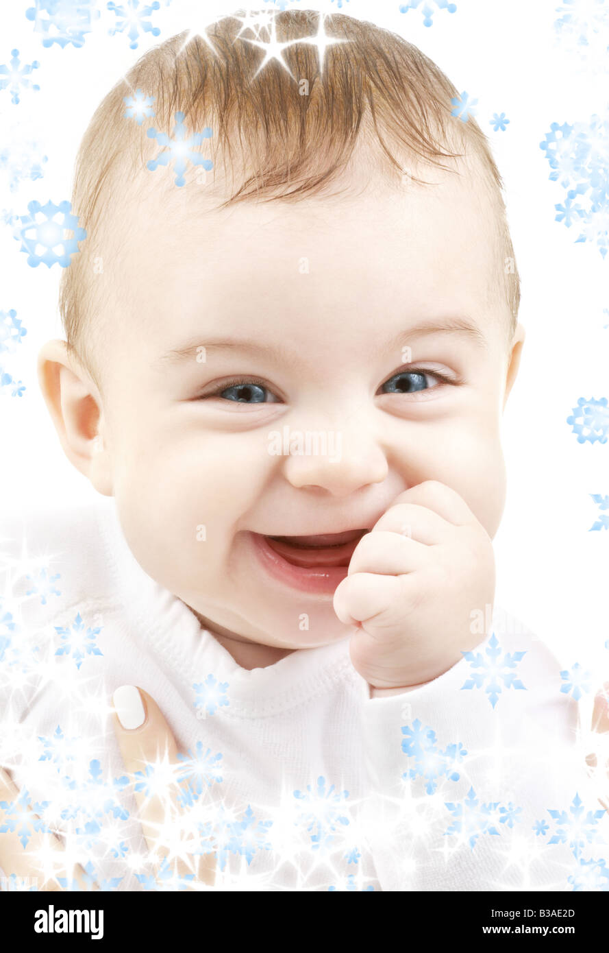 bright closeup portrait of adorable baby with snowflakes Stock Photo ...