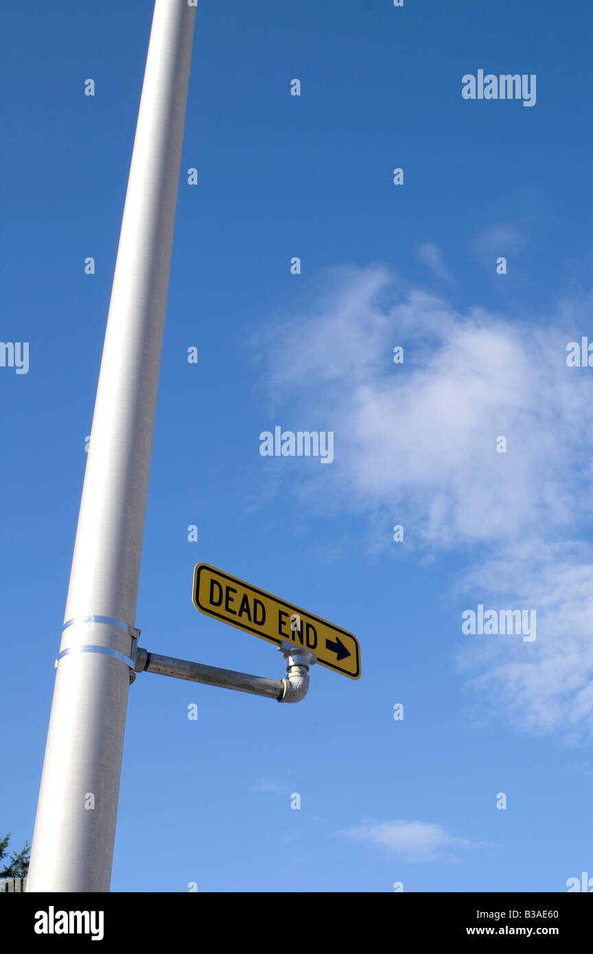 Dead End Street Sign on long Light Pole with Clear Blue Sky high white ...