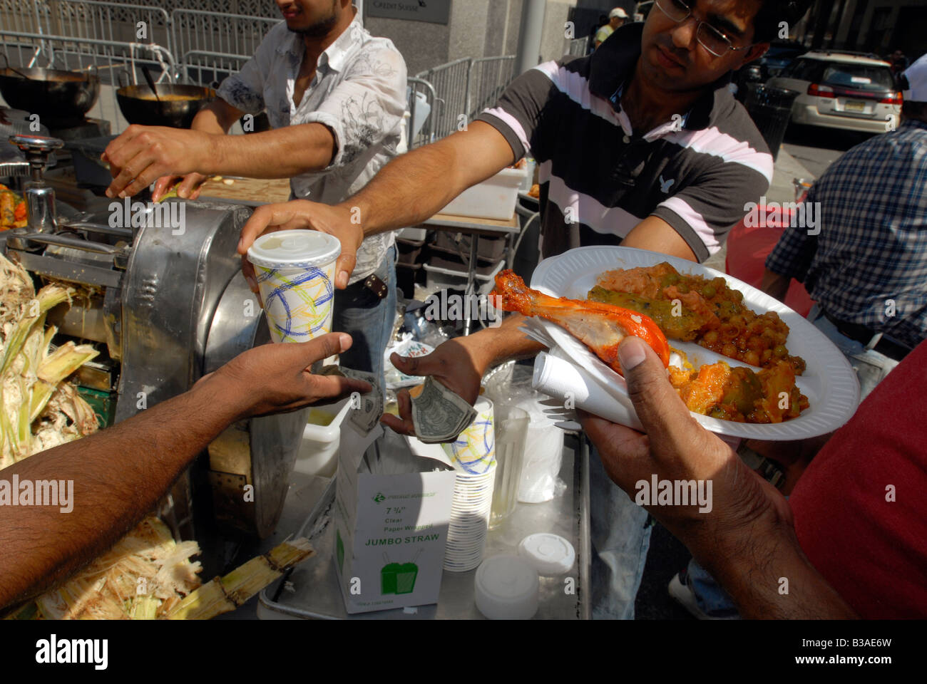 Parade goers are served authentic Indian food from the vendors at the ...