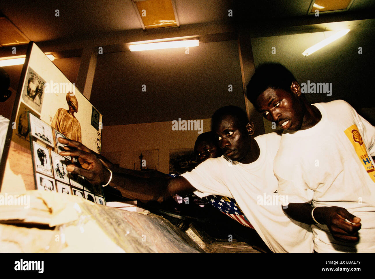 'TOUBA, AFRICA'S LITTLE MECCA', PEOPLE TOUCHING IMAGES OF AMADOU BAMBA ...
