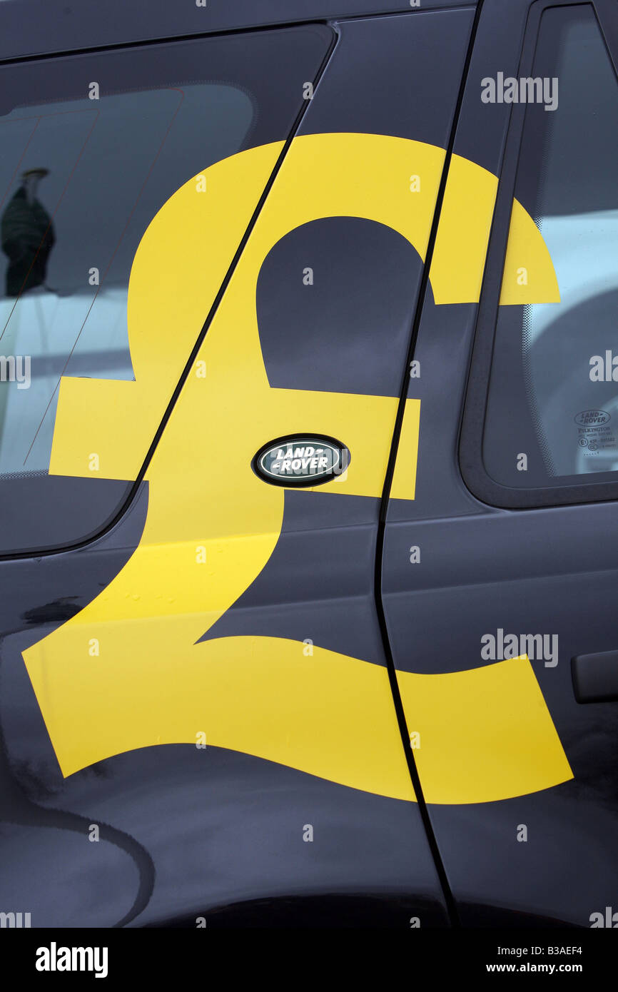 A pound sterling sign on a Land Rover Stock Photo - Alamy