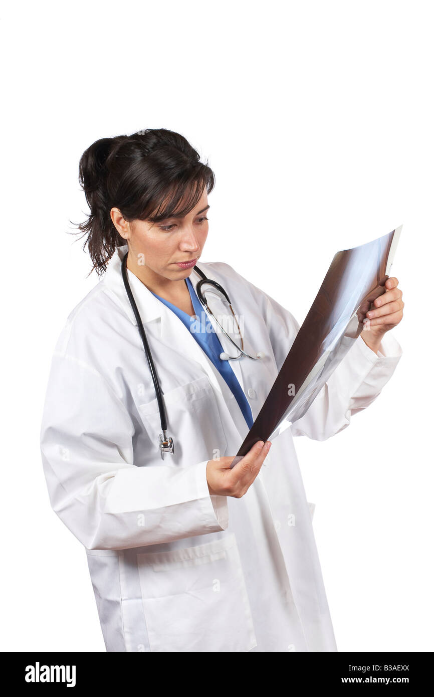 Friendly female doctor in lab coat examining x ray against white ...