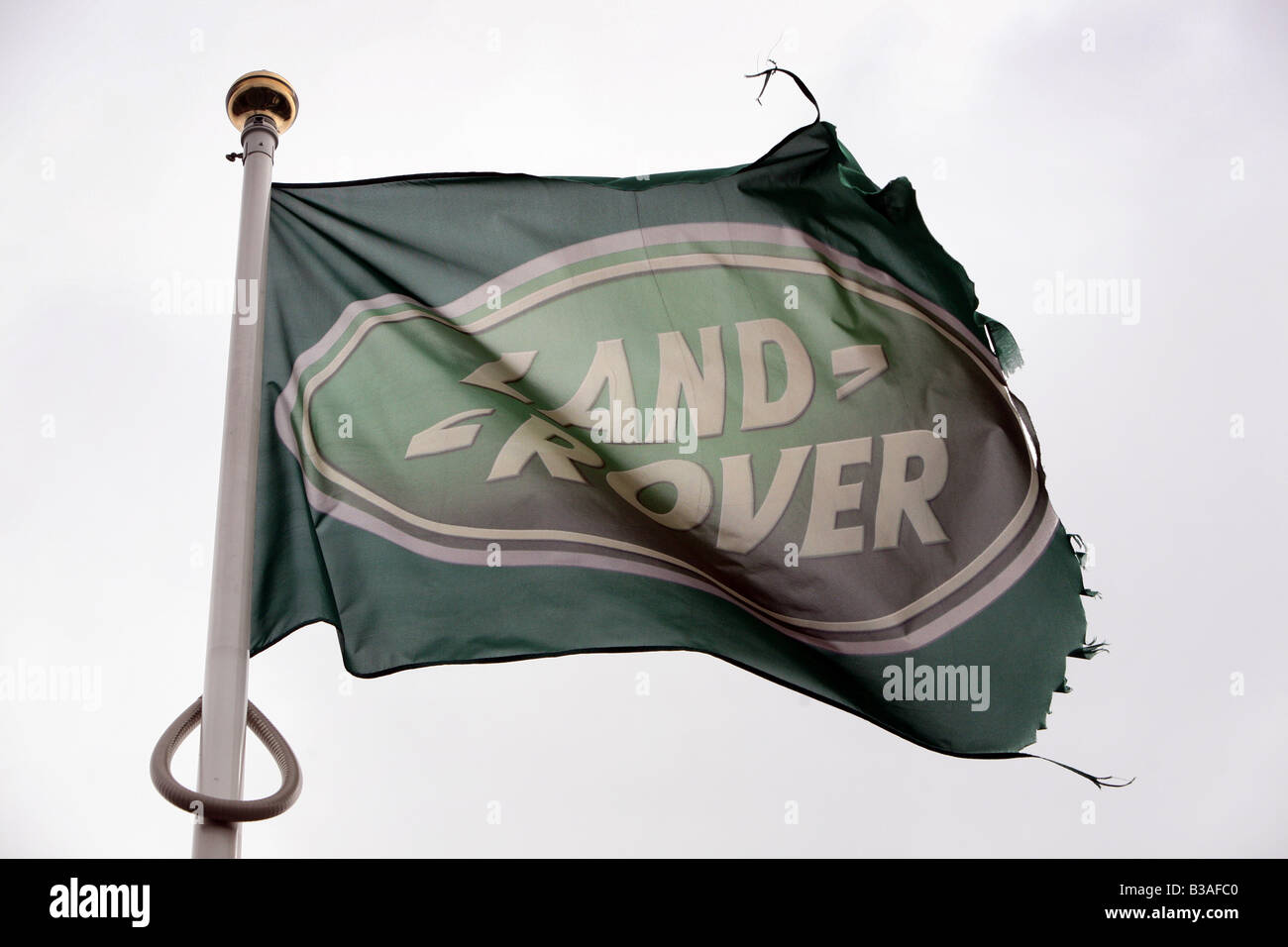 A flag at a Land Rover dealership Stock Photo - Alamy