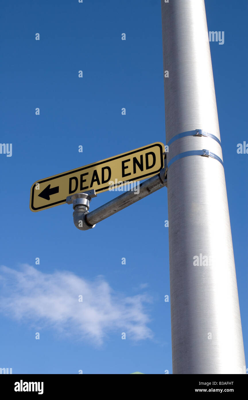 Dead End Street Sign on long Light Pole with Clear Blue Sky high white ...