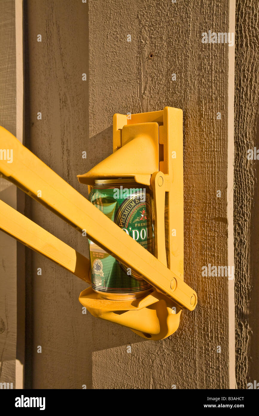 Inexpensive aluminum can crusher mounted on wall Stock Photo - Alamy
