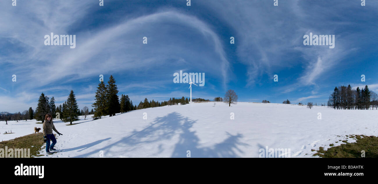 Panorama of the Mont Soleil cross-country skiing area. A wind turbine ...