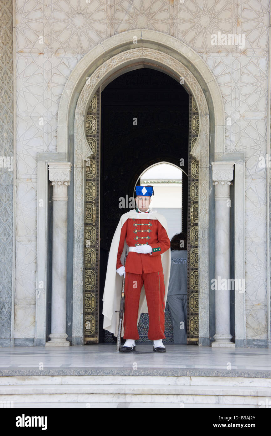 A royal guard stands at the entrance to the Mausoleum of Mohammed V in ...
