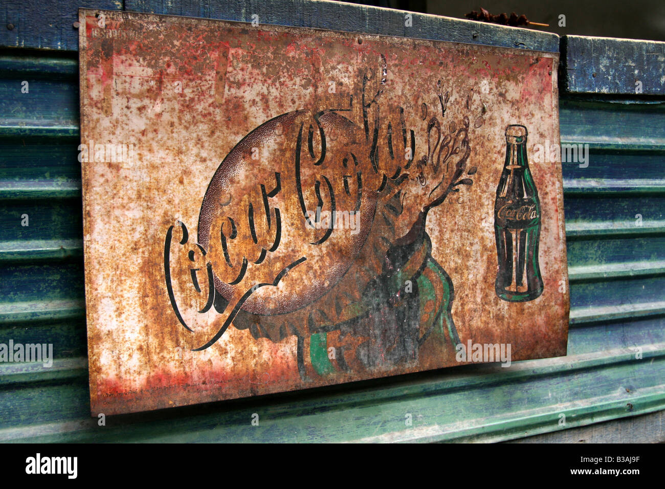 "Old decaying rusty coca cola Advertising sign Stock Photo - Alamy