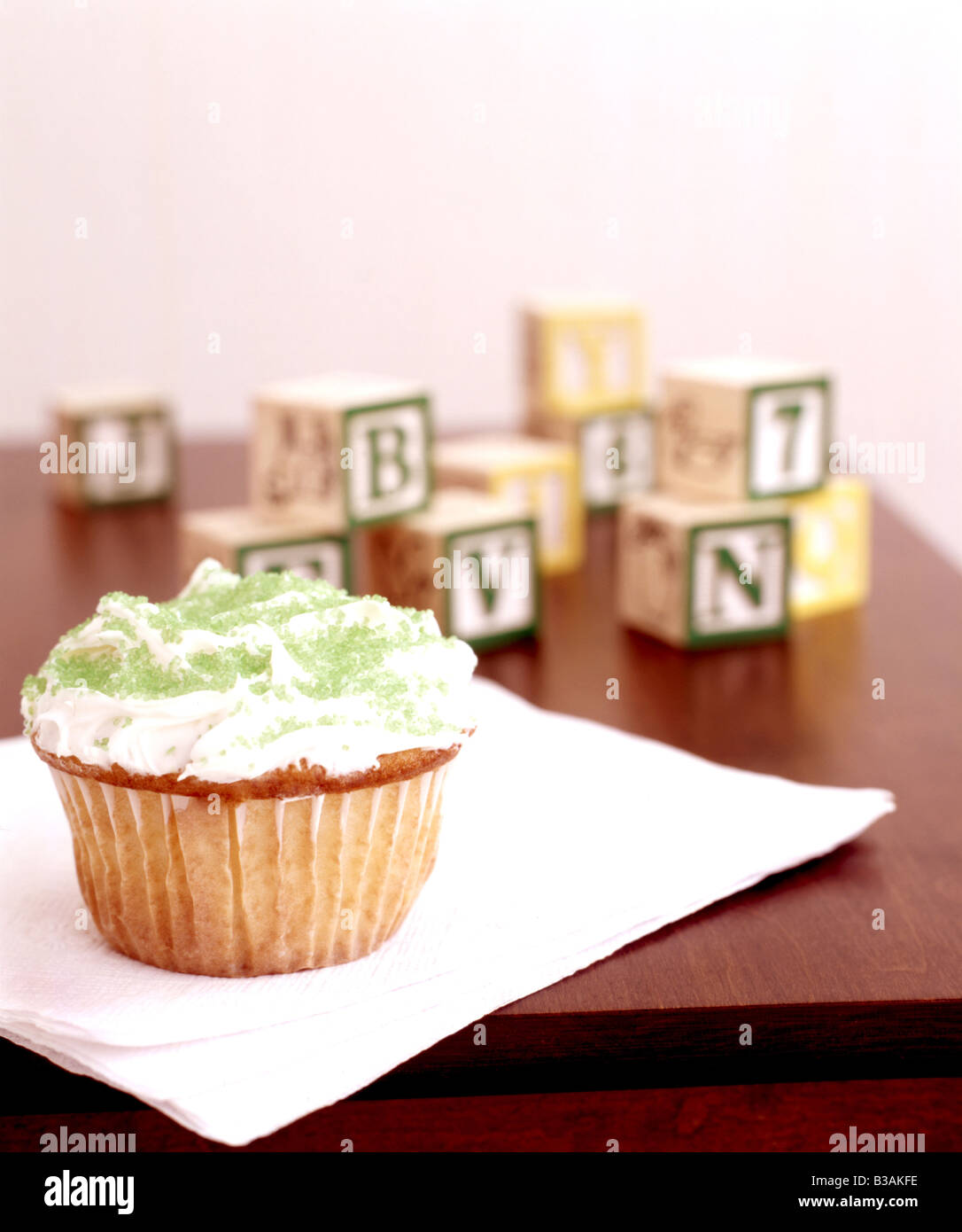 A cupcake surrounded by children's blocks Stock Photo - Alamy