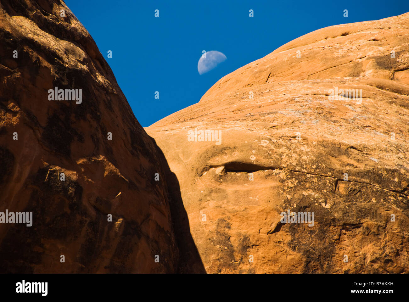 The moon rises over the red rock of Arches National Park Utah Stock ...