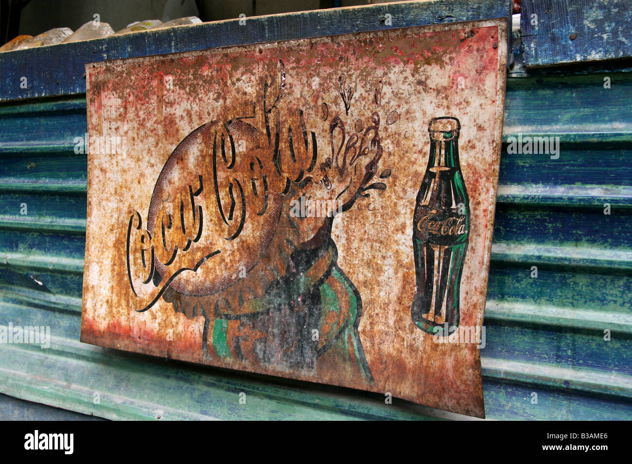 "Old decaying rusty coca cola Advertising sign Stock Photo - Alamy