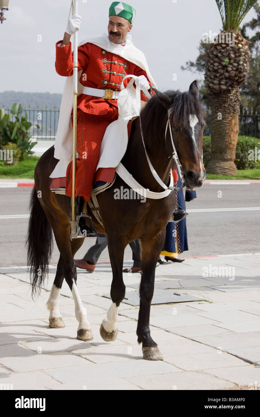A royal guard stands at the entrance to the Mausoleum of Mohammed V in ...