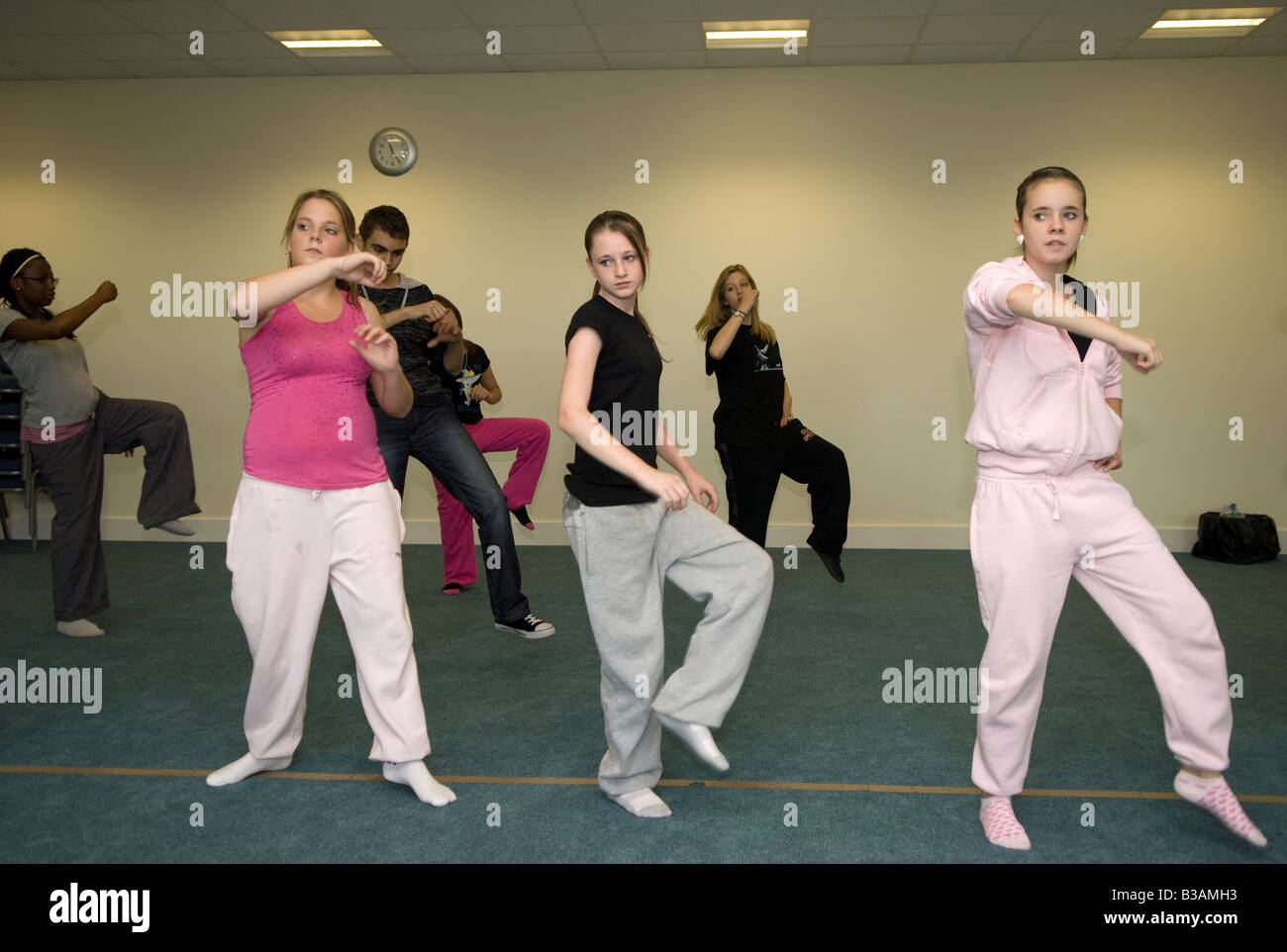 Young people taking part in a dance fame academy session the aim is to ...