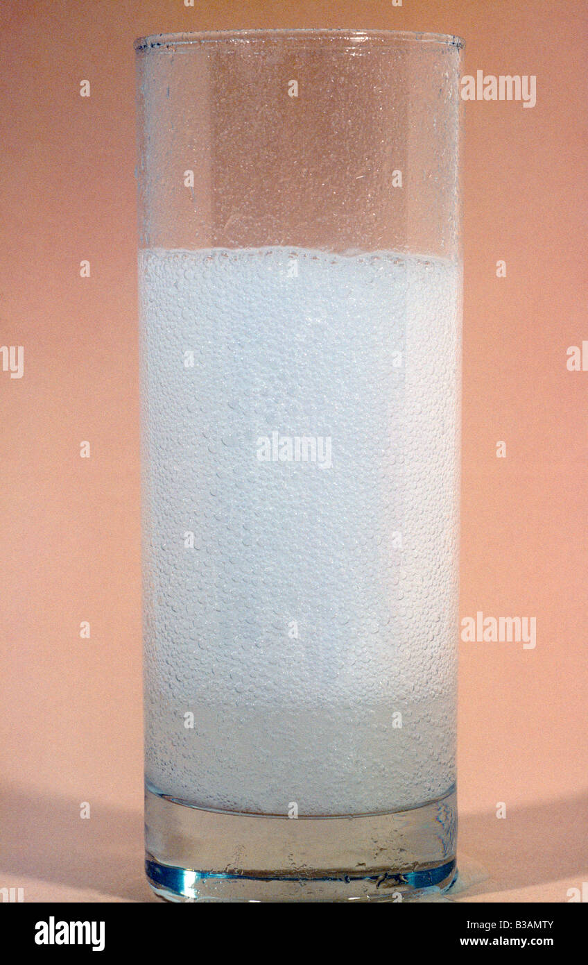 Baking Soda & Vinegar Fizzing In Glass Stock Photo - Alamy